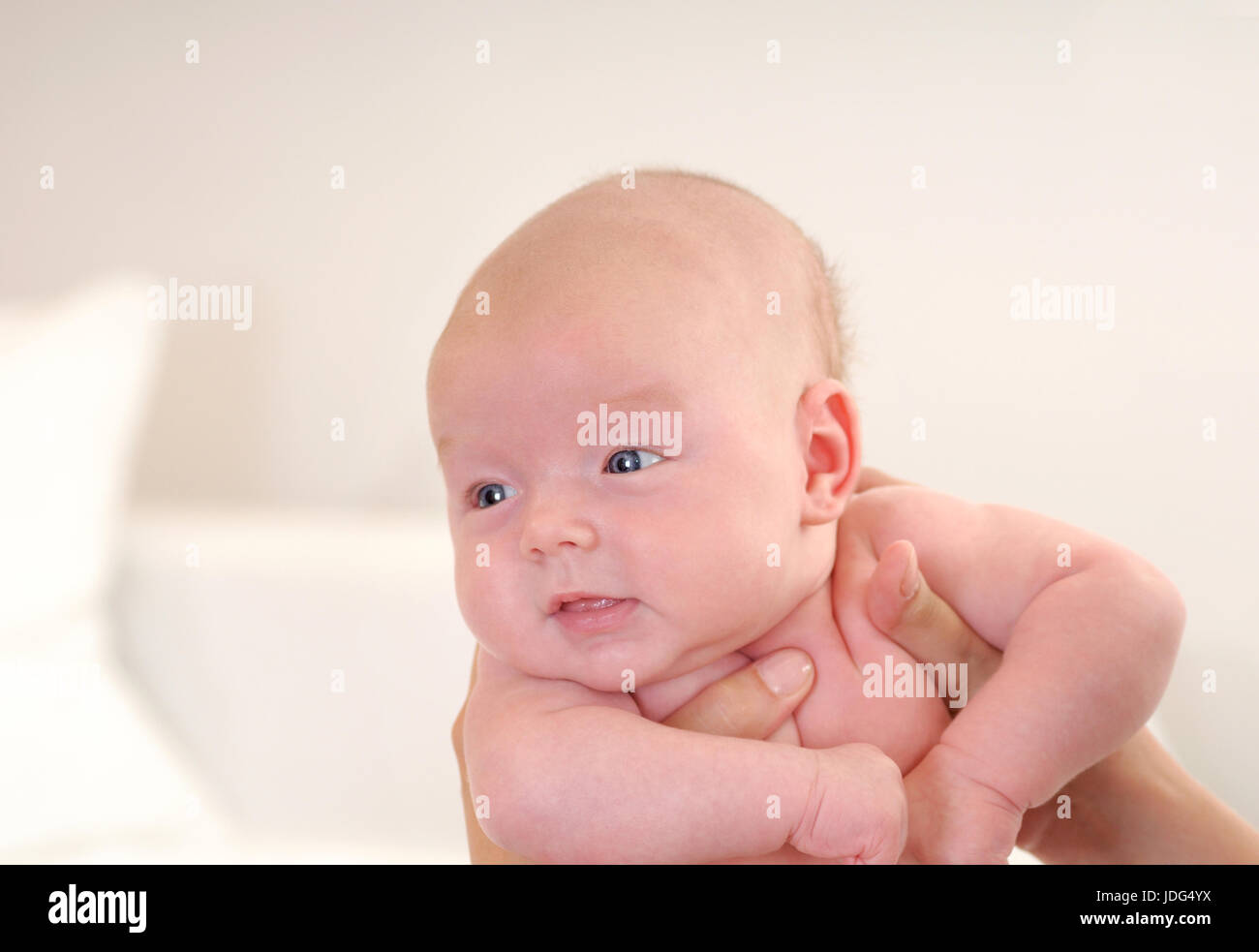 Cradled baby hi-res stock photography and images - Alamy