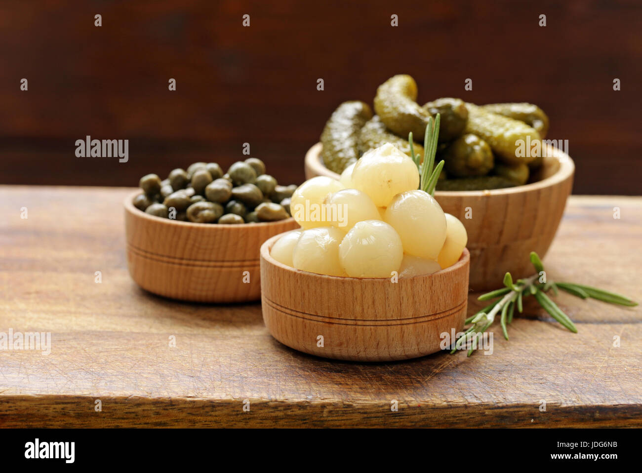 marinated pearl onions pickled cucumbers and capers Stock Photo - Alamy