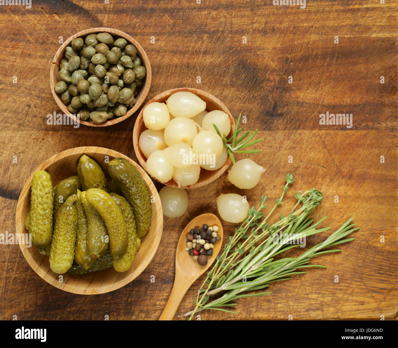 marinated pearl onions pickled cucumbers and capers Stock Photo - Alamy