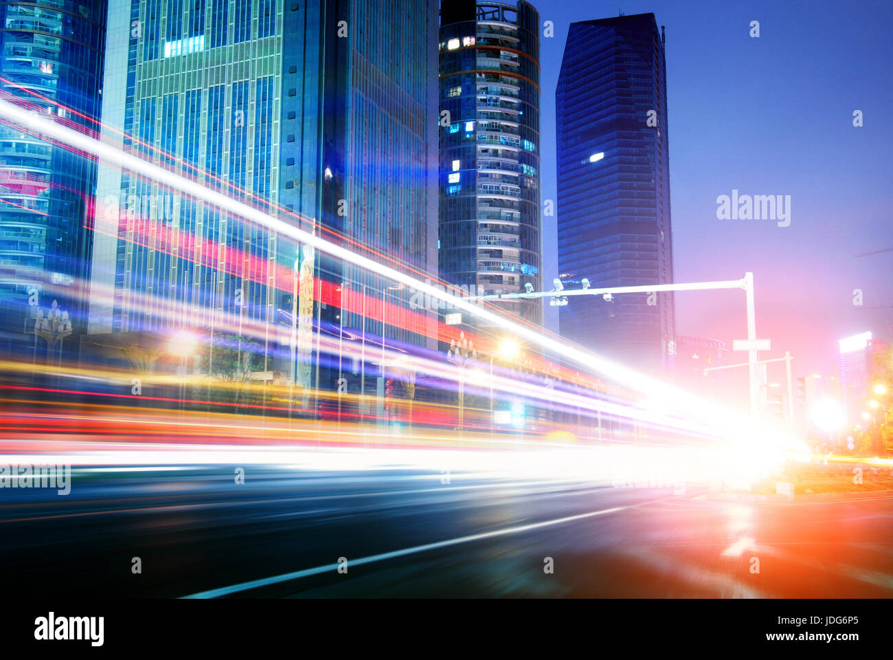The light trails on the modern building background in shanghai china ...