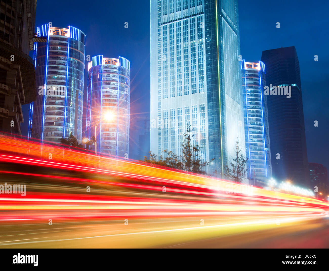 The light trails on the modern building background in shanghai china ...