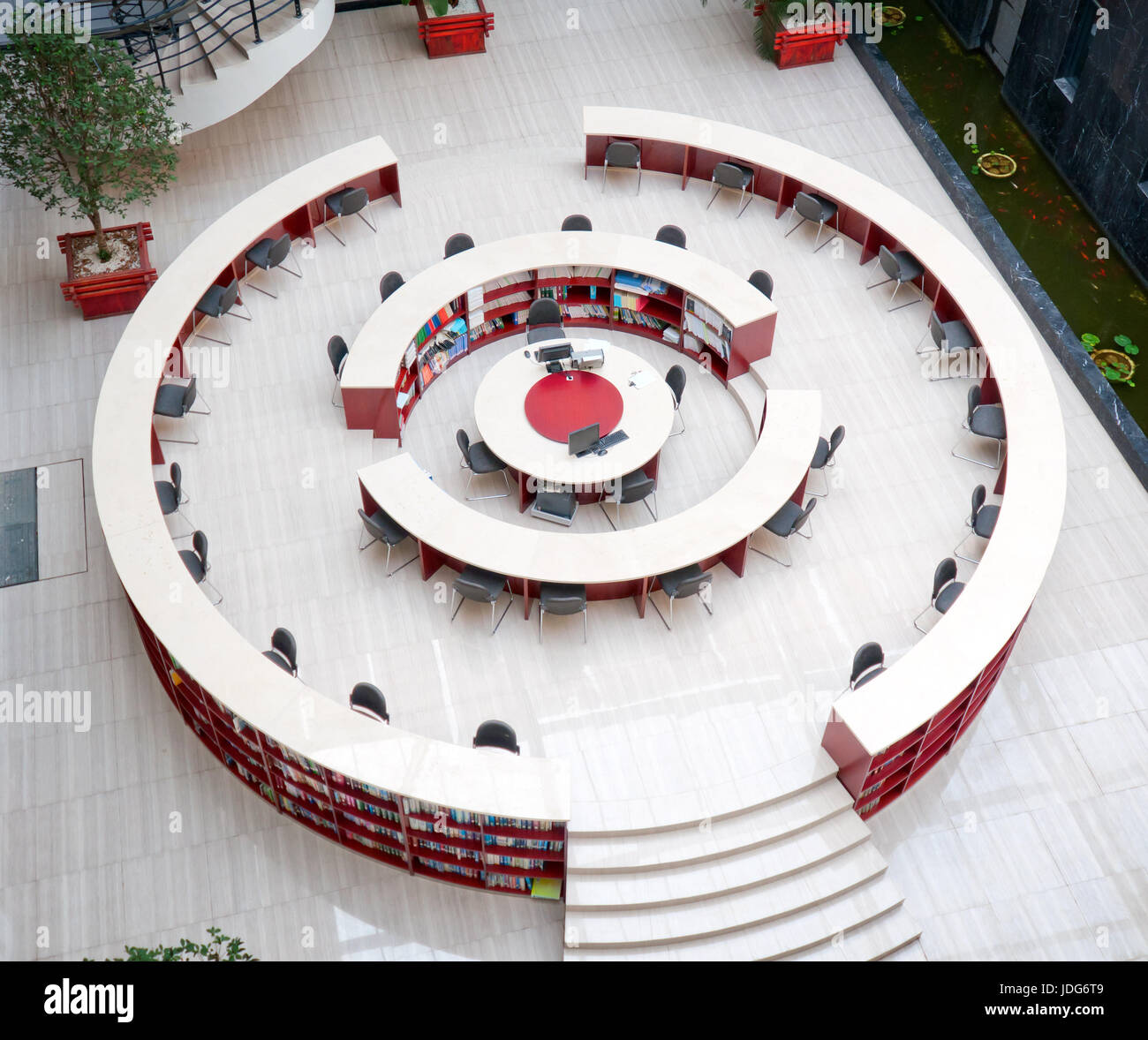 Small library, round the shelves, bird's eye view Stock Photo - Alamy