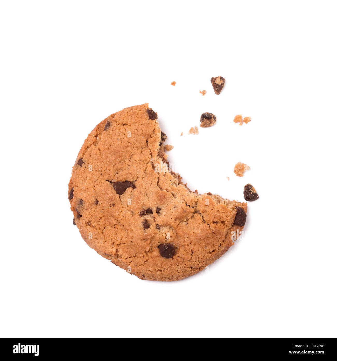 Single round chocolate chip biscuit with crumbs and bite missing ...
