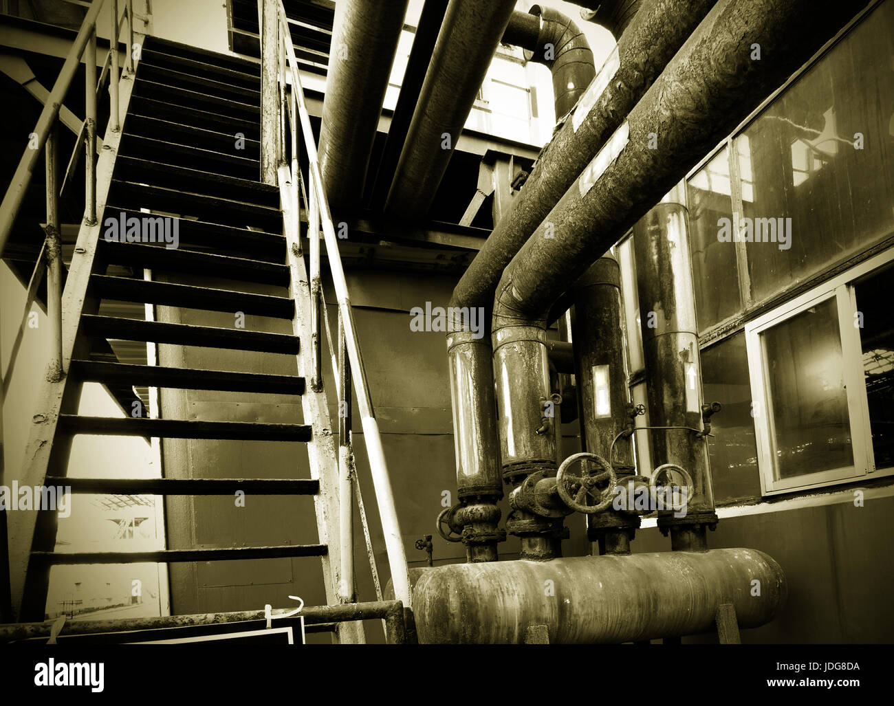 Abandoned factories, stairways and pipes Stock Photo - Alamy