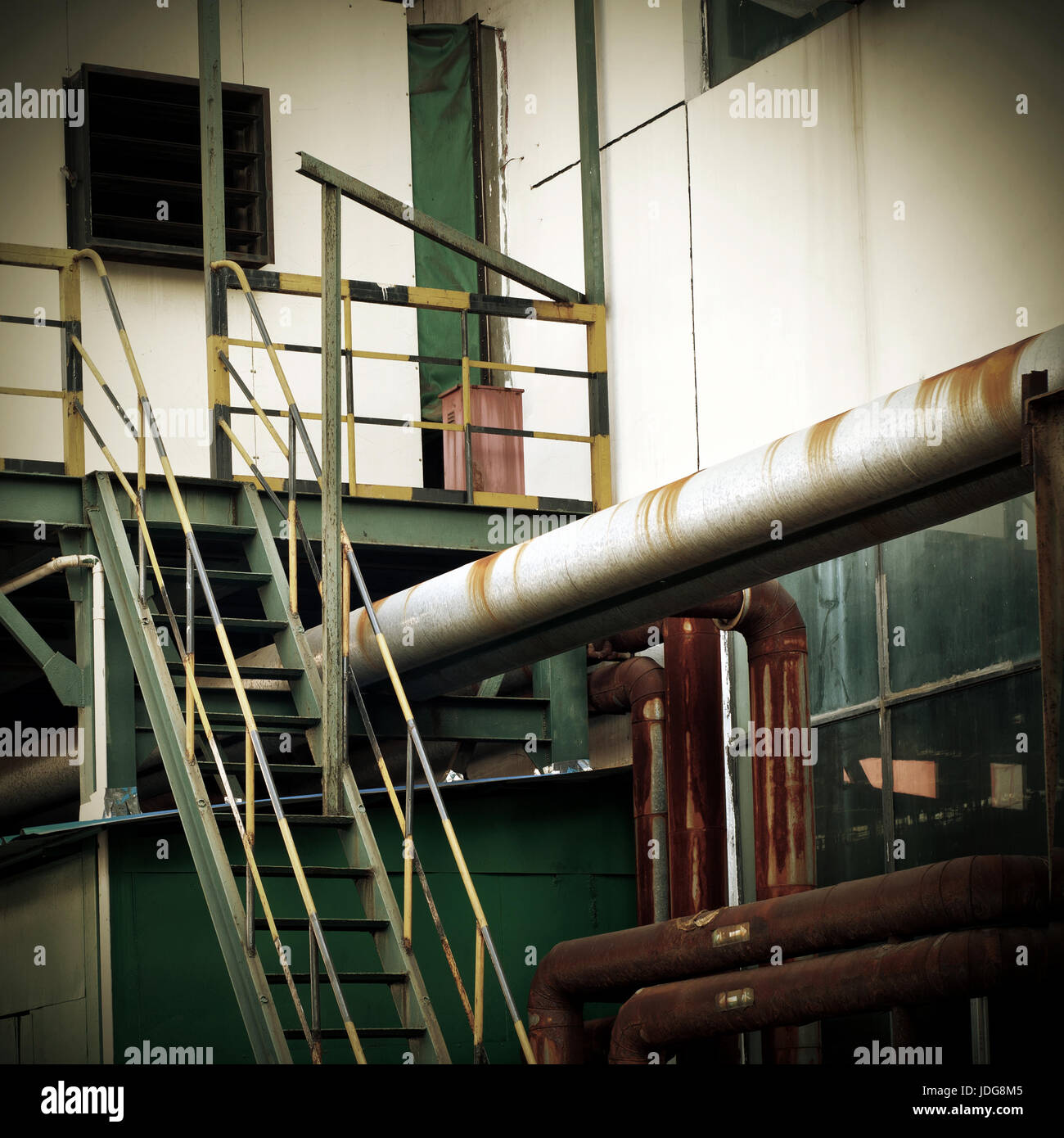 Abandoned factories, stairways and pipes Stock Photo - Alamy