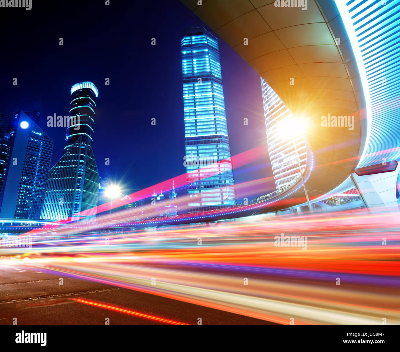 the light trails on the modern building background in shanghai china ...