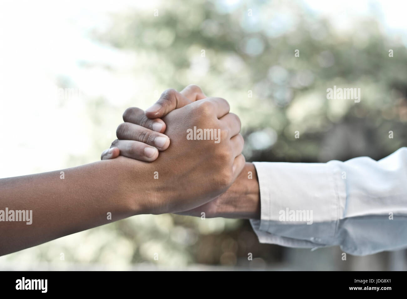 Helping hands of god hi-res stock photography and images - Alamy