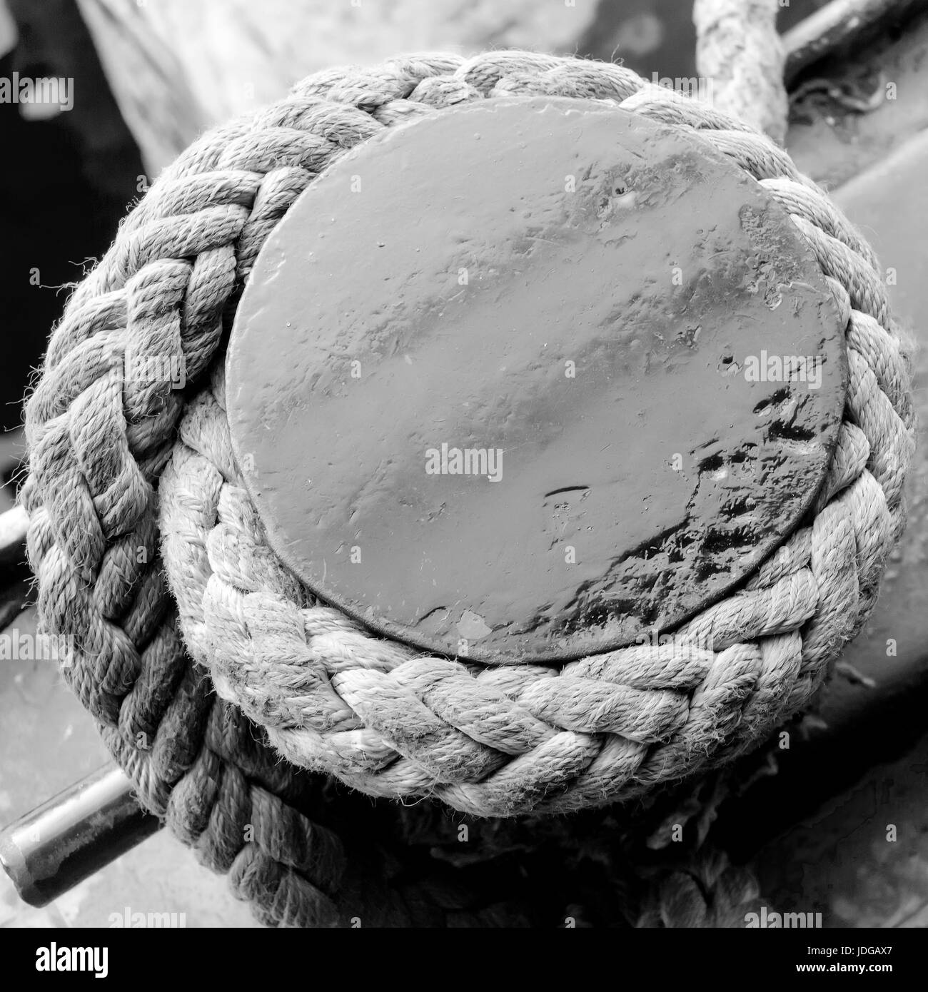 Old rope secured to an old rusty cleat on a wood pier Stock Photo - Alamy