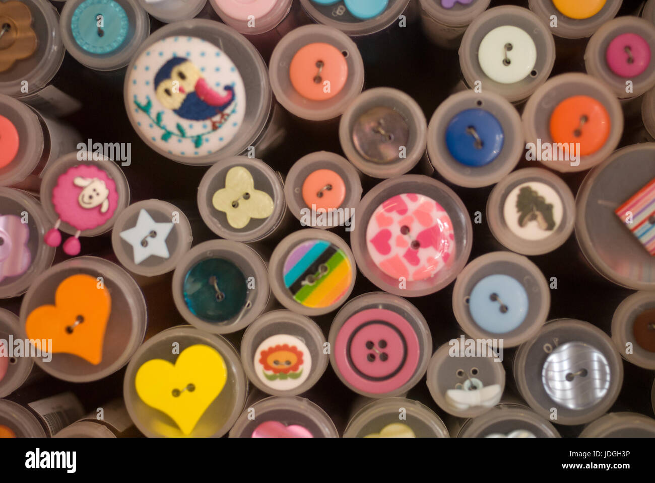 Tubes of Buttons Stock Photo - Alamy