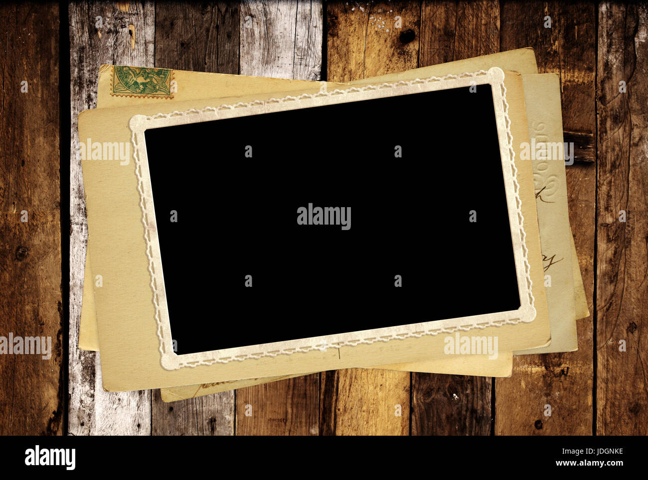 Vintage post cards and photo on old wooden planks Stock Photo - Alamy