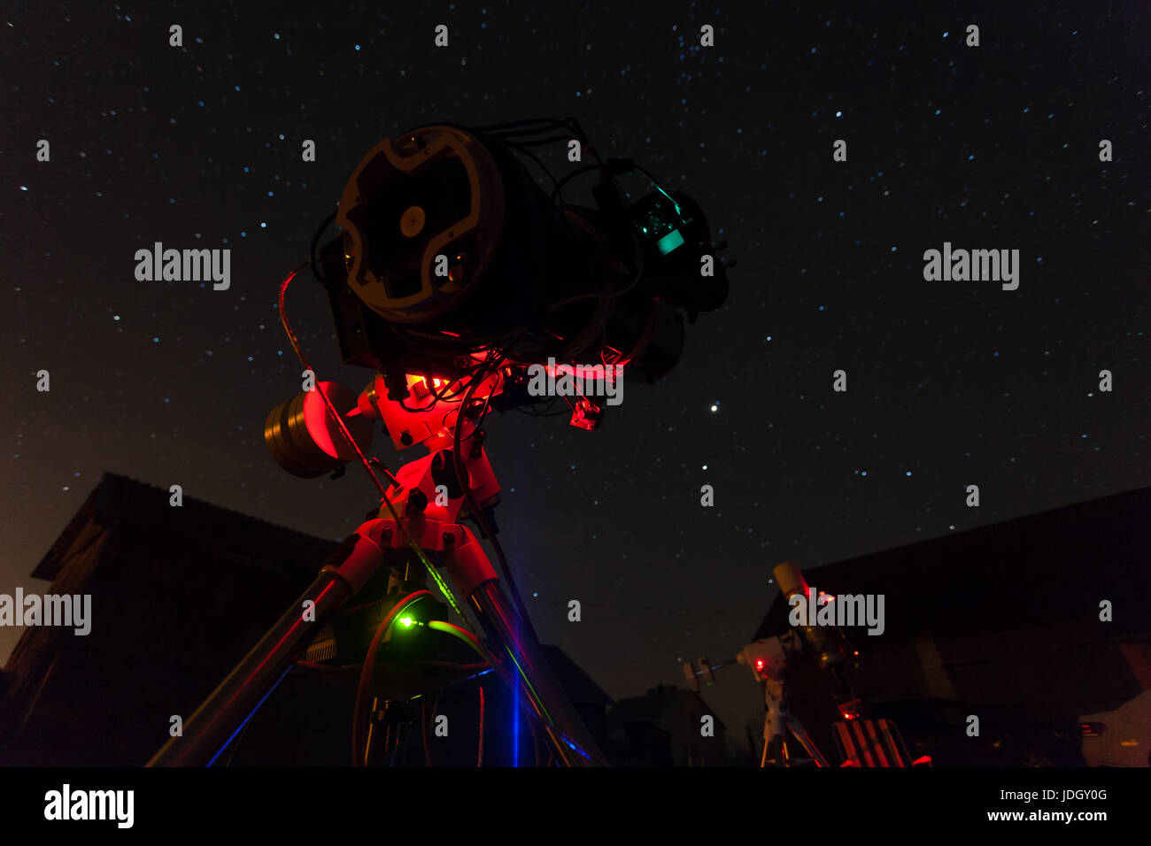 Professional astrophotography telescope equipped with guider scope and ...