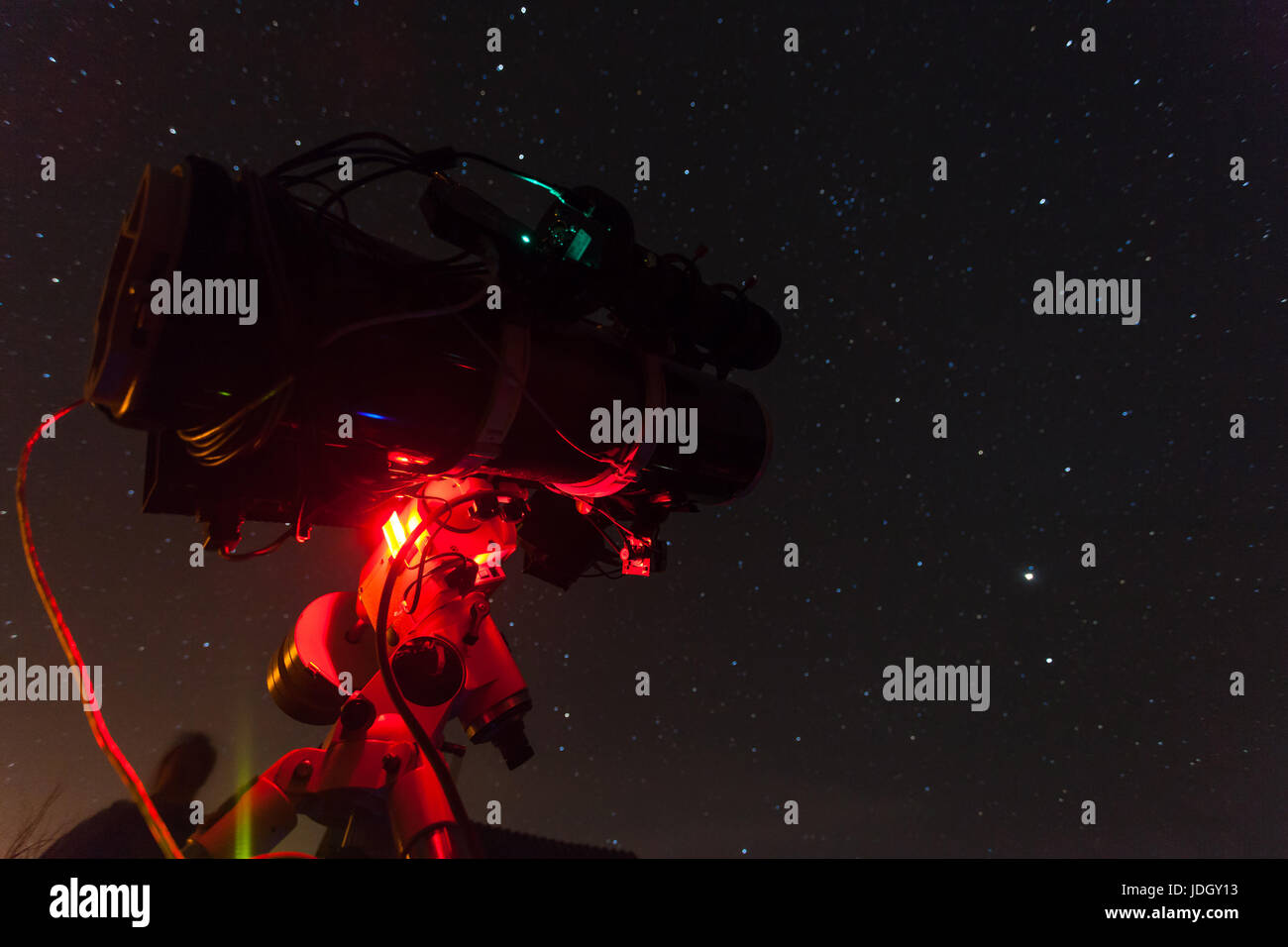 Professional astrophotography telescope equipped with guider scope and ...