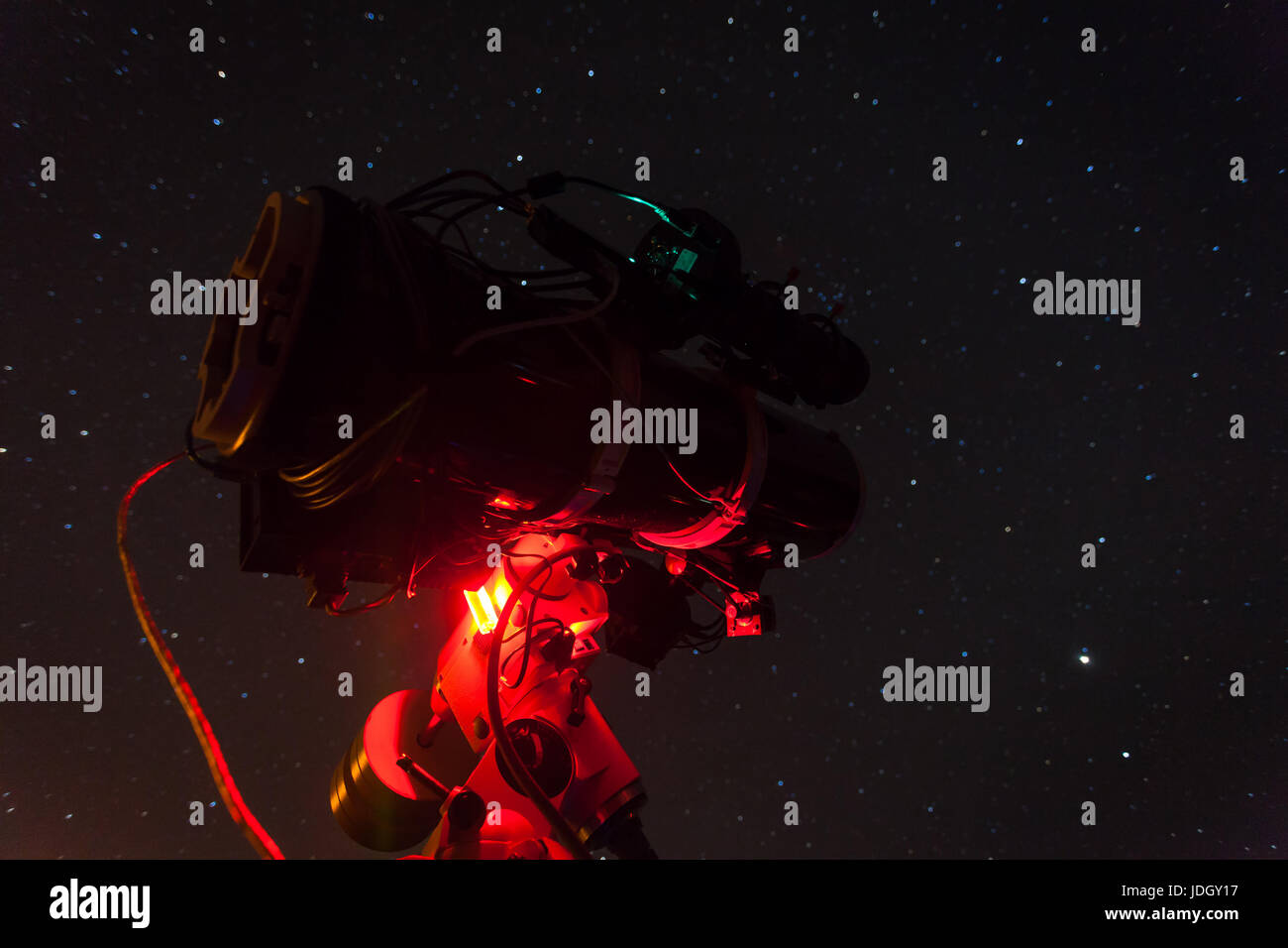 Professional astrophotography telescope equipped with guider scope and ...