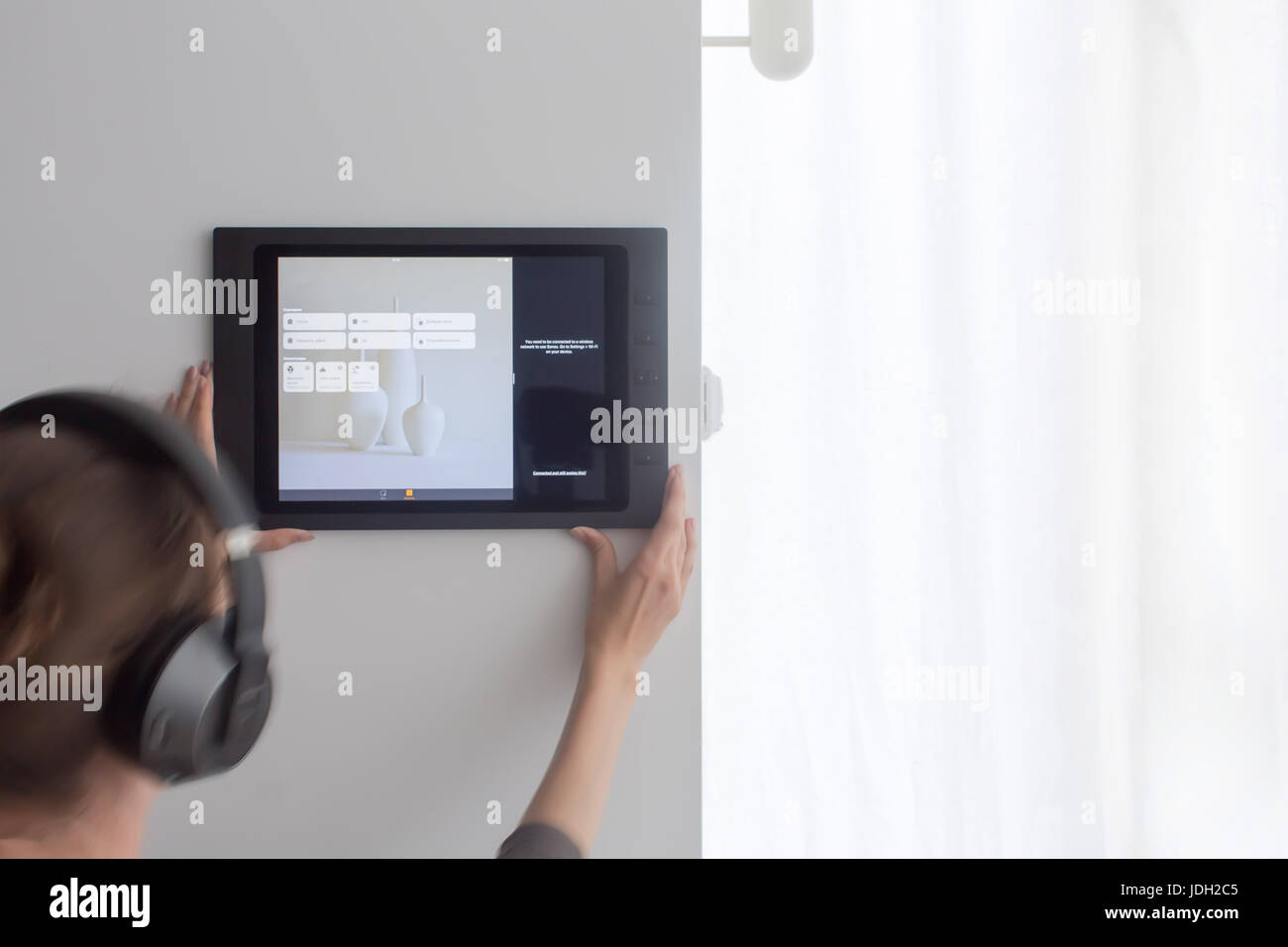 Smart thermostat hand setting hi-res stock photography and images - Alamy