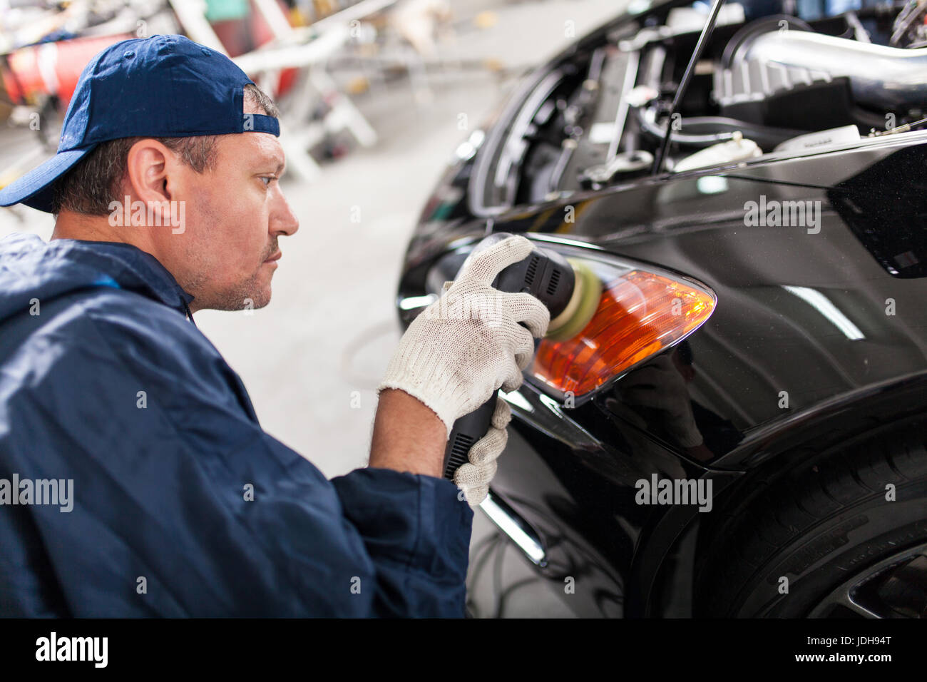 Sports car in a workshop Stock Photo - Alamy