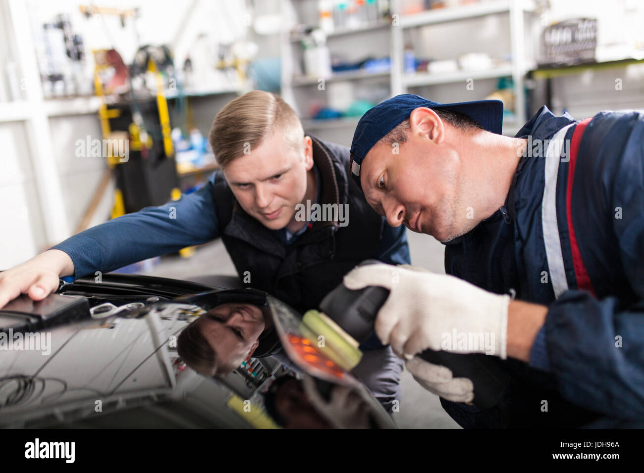 Sports car in a workshop Stock Photo - Alamy