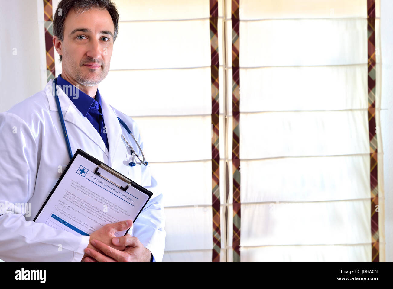 Caucasian general doctor in consultation front position prescribe ...