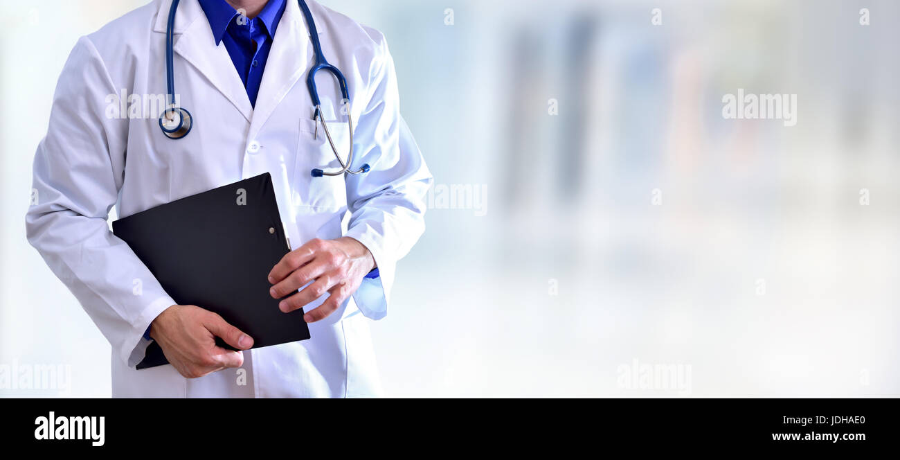 Caucasian general doctor with black clipboard concept. Front position ...