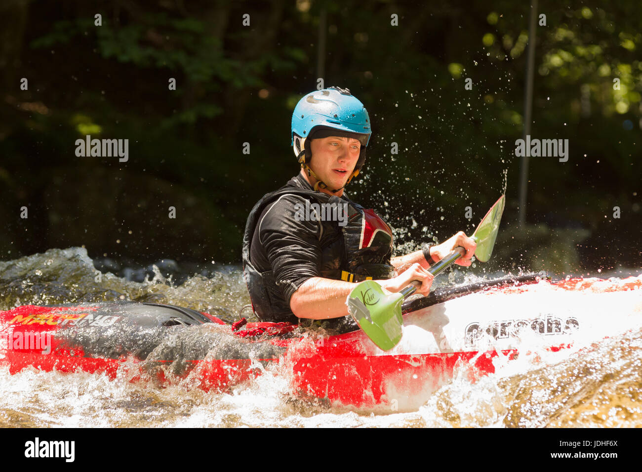 White water kayaker shooting the rapids at the National White Water ...