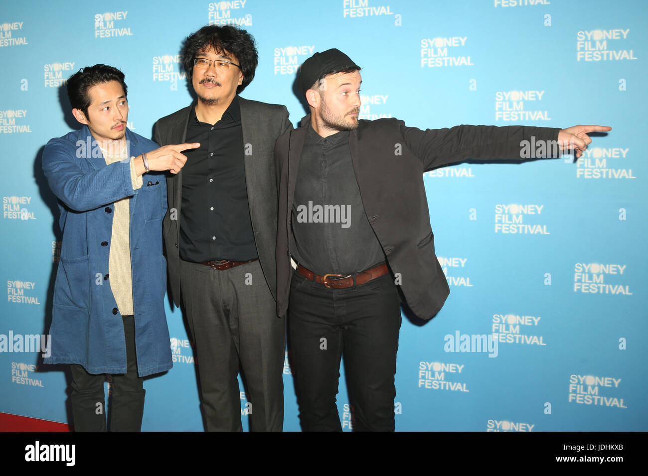 L-R: Steven Yeun (actor), Bong Joon-Ho (South Korean Film Director) and ...