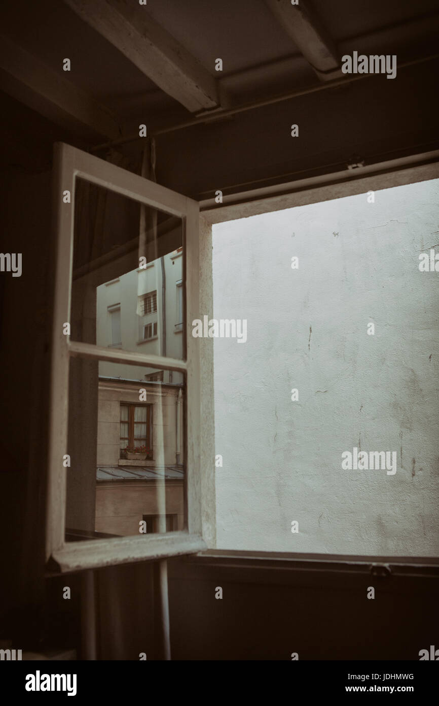 Reflections in an open window in Paris Stock Photo - Alamy