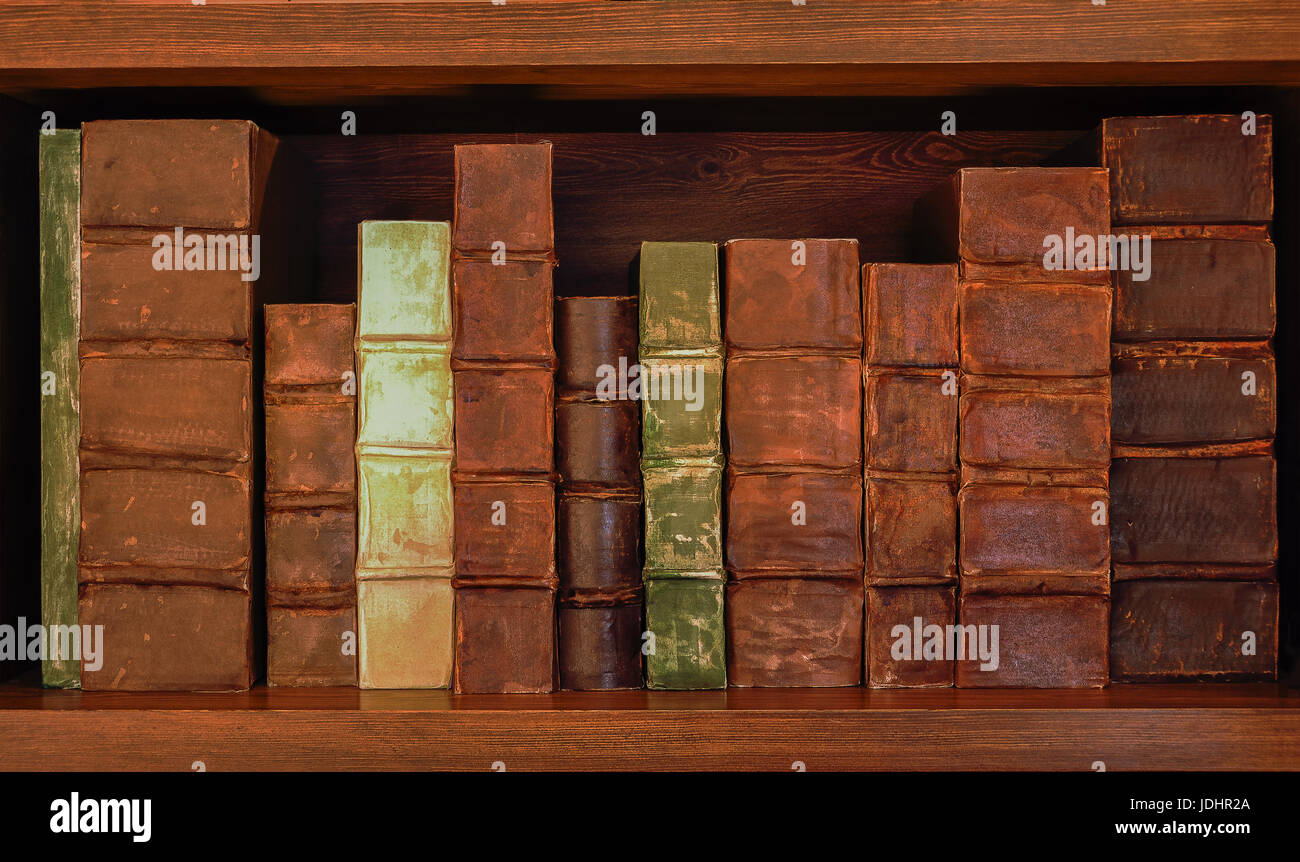 Antique books on old wooden shelf. Shelf with old books Stock Photo - Alamy