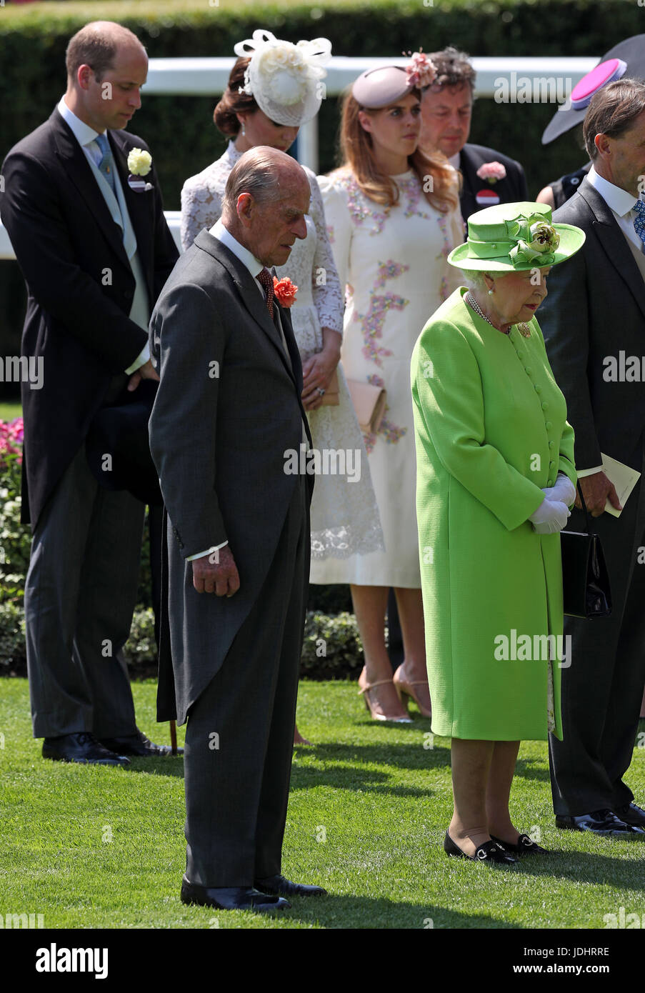 Prince Philip and Queen Elizabeth observe a minute's silence in honour ...