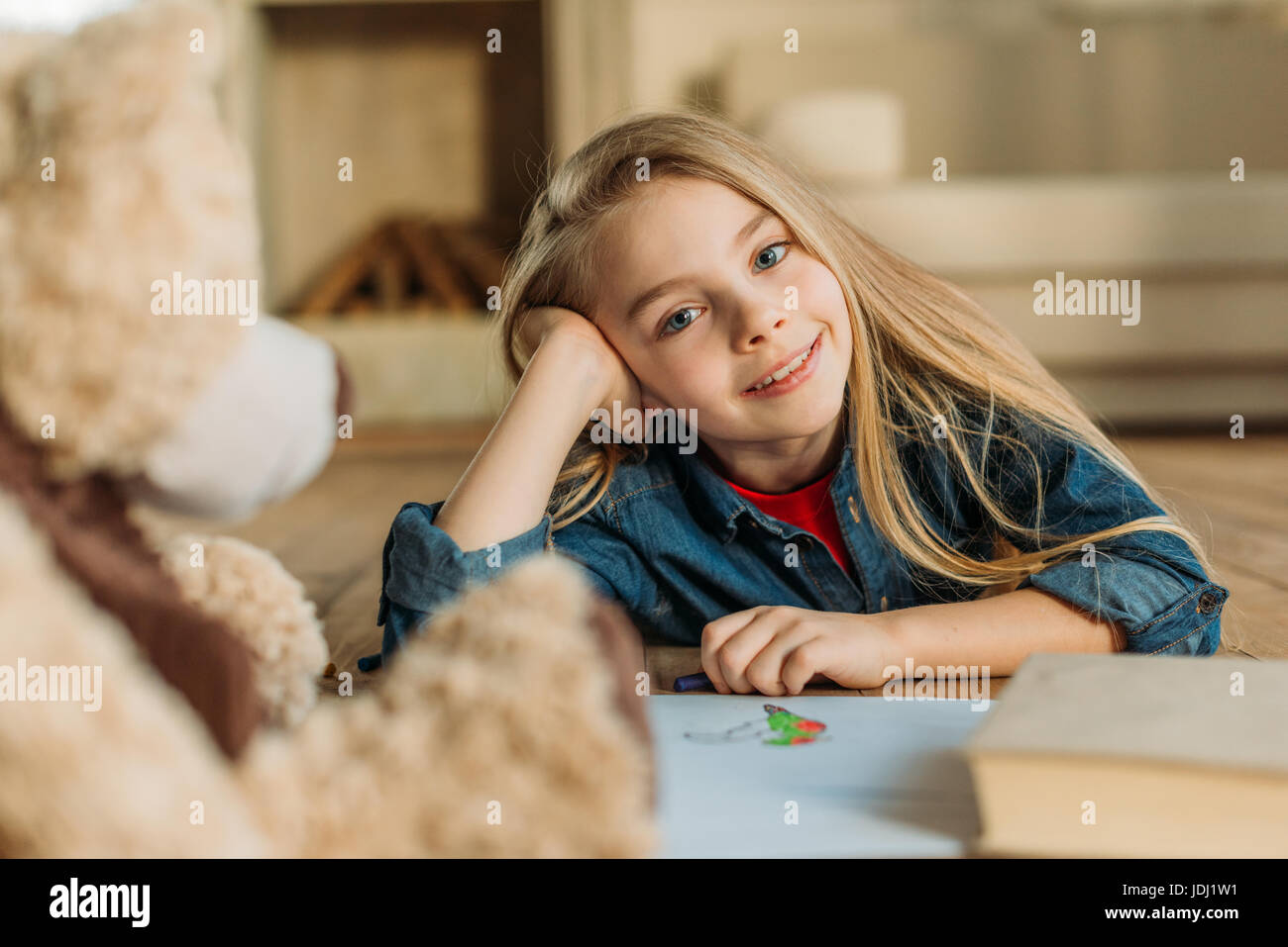 portrait of smiling girl drawing picture with pencils, kids drawing ...