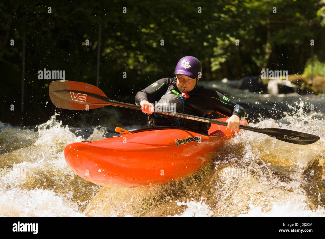 White water kayaker shooting the rapids at the National White Water ...