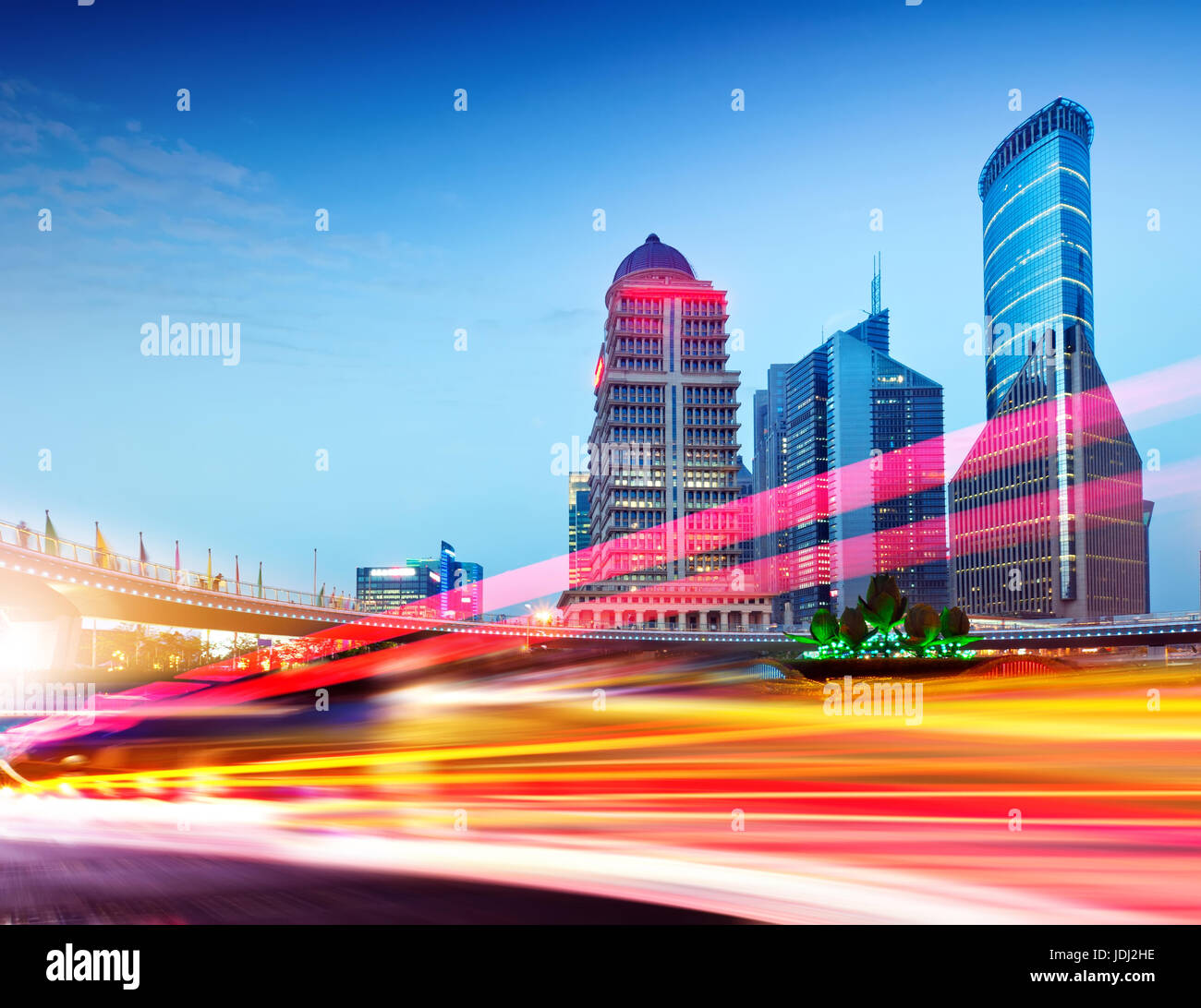 the light trails on the modern building background in shanghai china ...