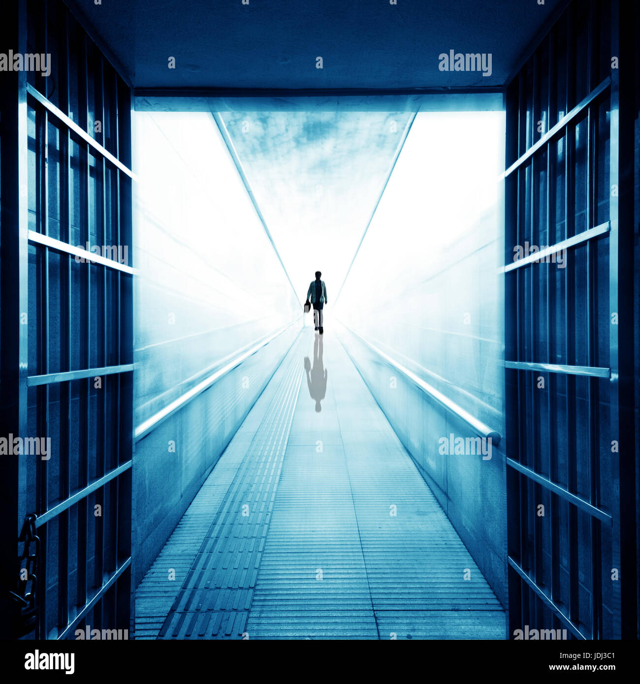 The men in the underground pedestrian tunnel Stock Photo - Alamy