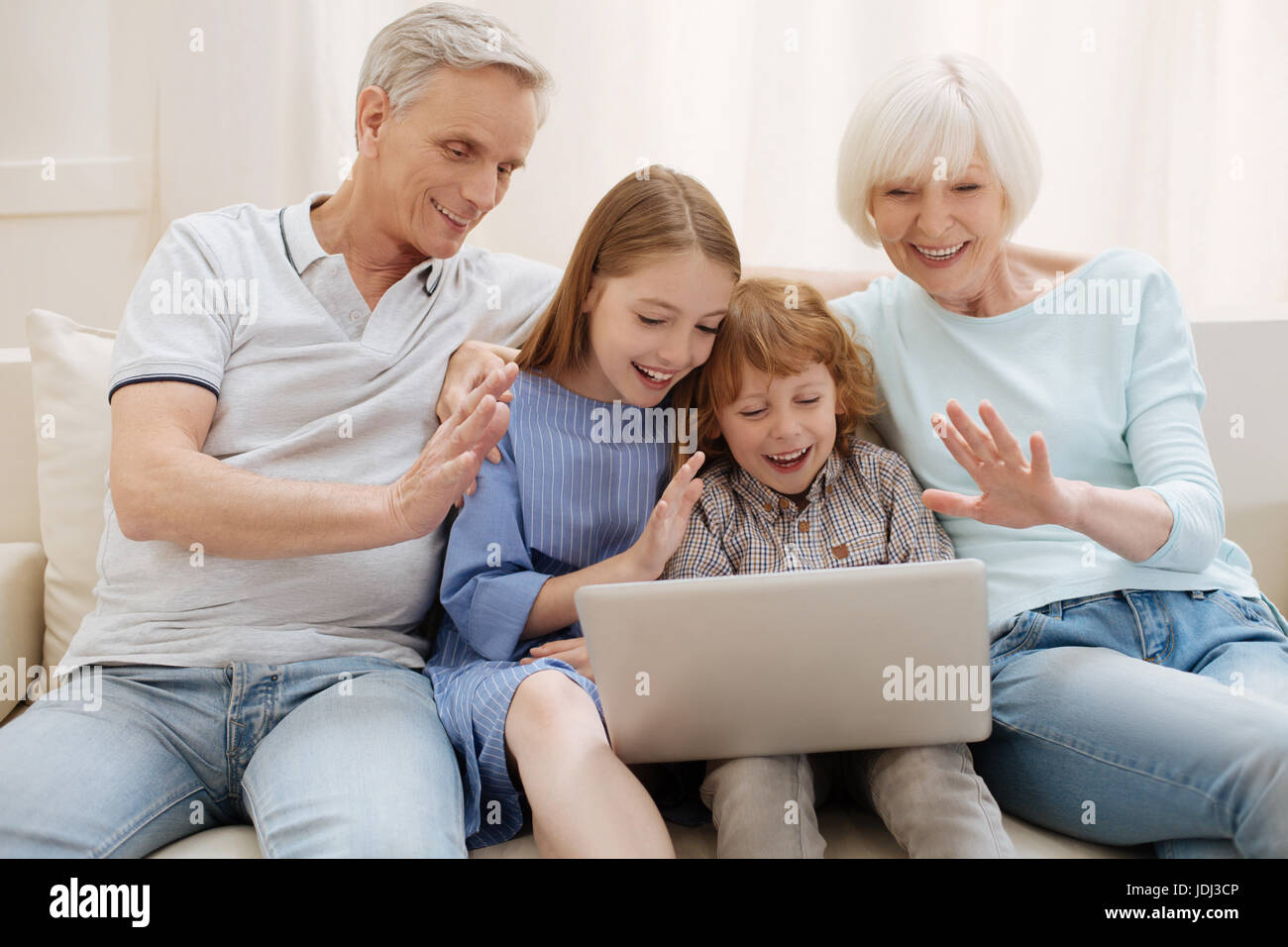 Enthusiastic happy children calling the parents Stock Photo - Alamy