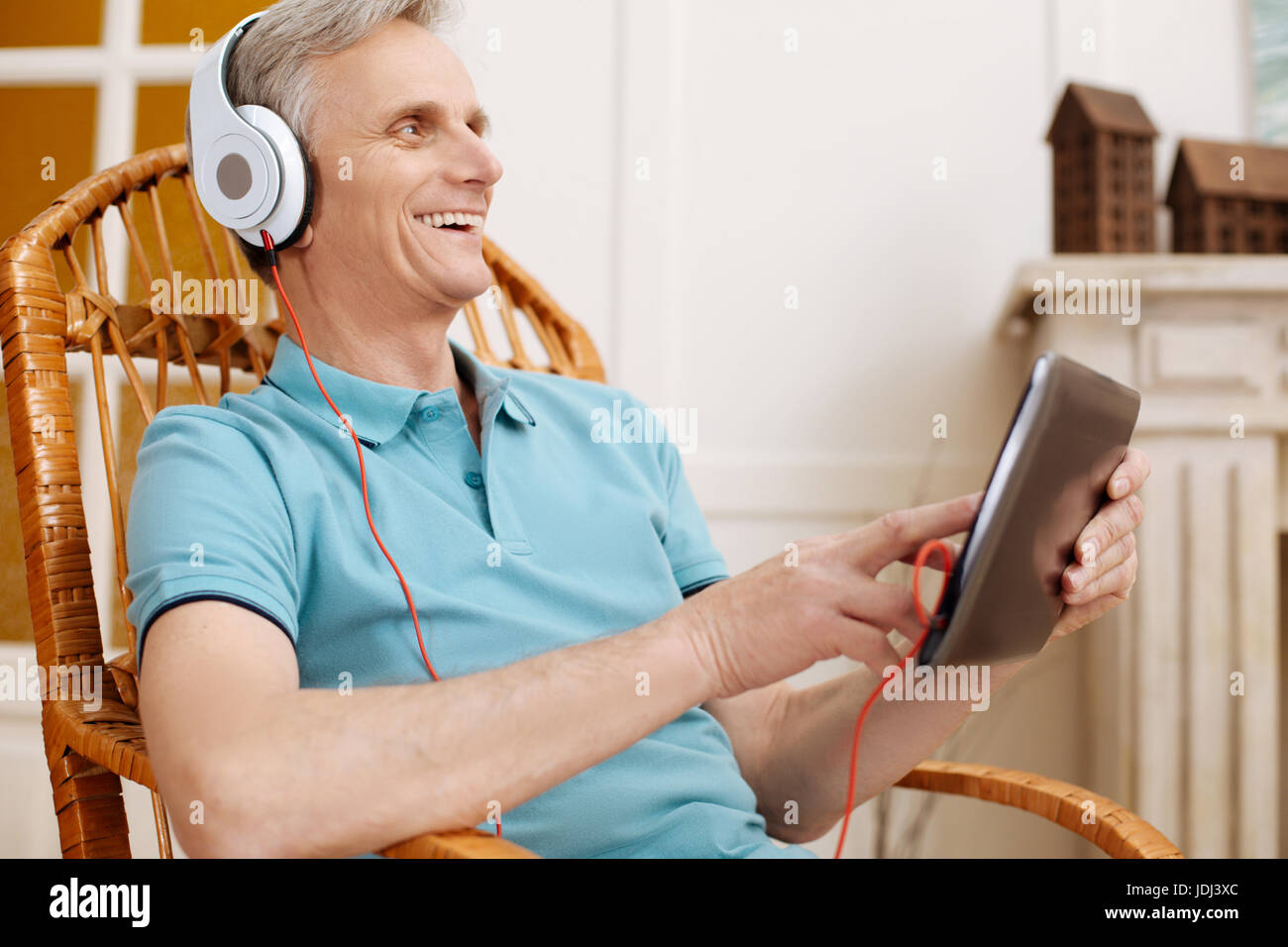 Charming smart gentleman using modern technologies Stock Photo - Alamy