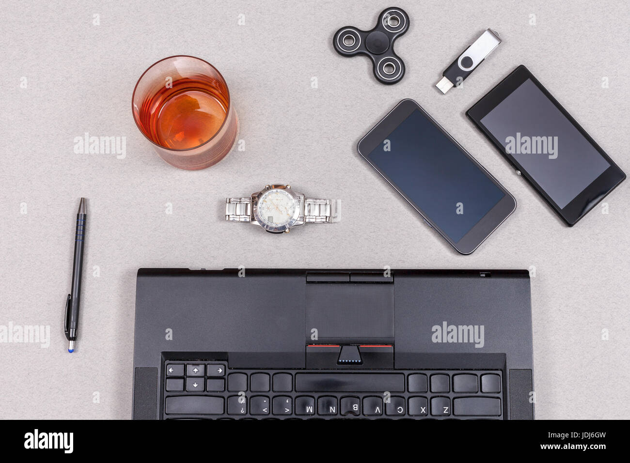 Random office items on table background, notepad, smartphone, pendrive ...