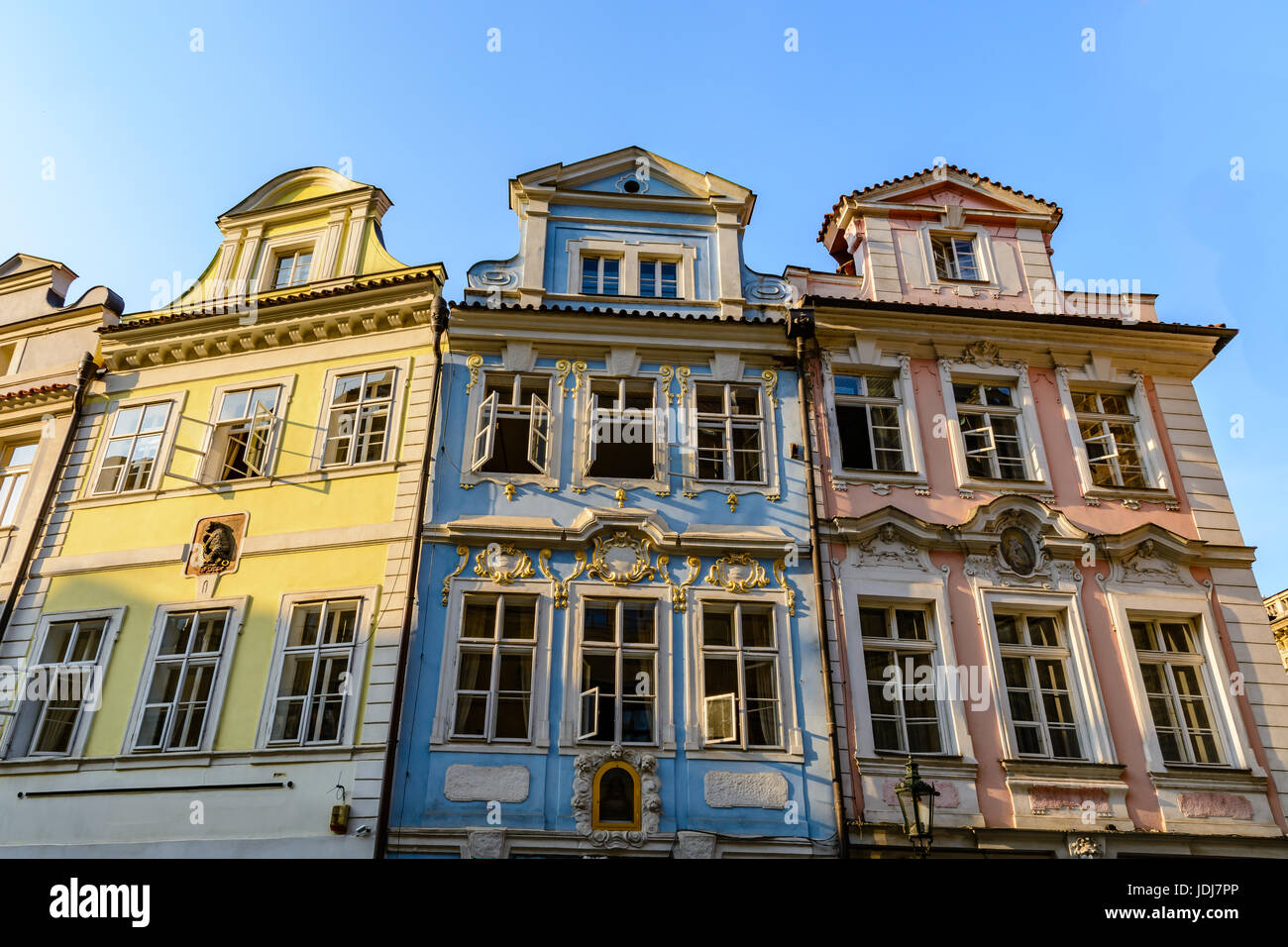 Beautiful traditional building facades with different colours in Prague ...
