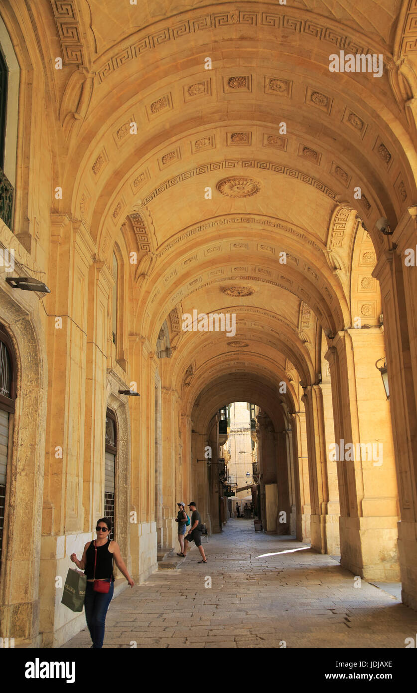 Arched stone passageway gallery National Library building, Valletta ...