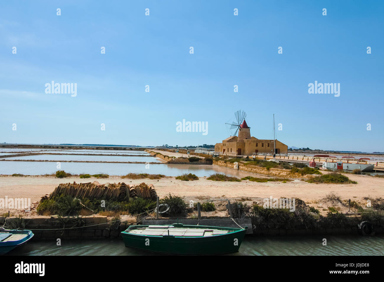 Sea salt production, salt wind mills are seen in suburbs of Marsala ...