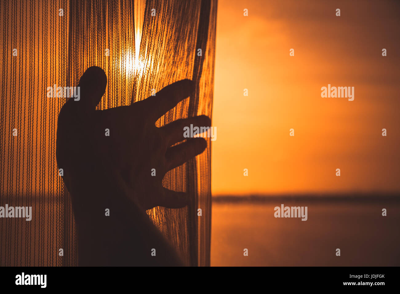 Male hand opens curtains view hi-res stock photography and images - Alamy