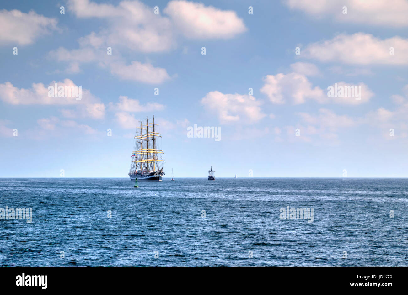 Sailing ship in the blue sea Stock Photo - Alamy