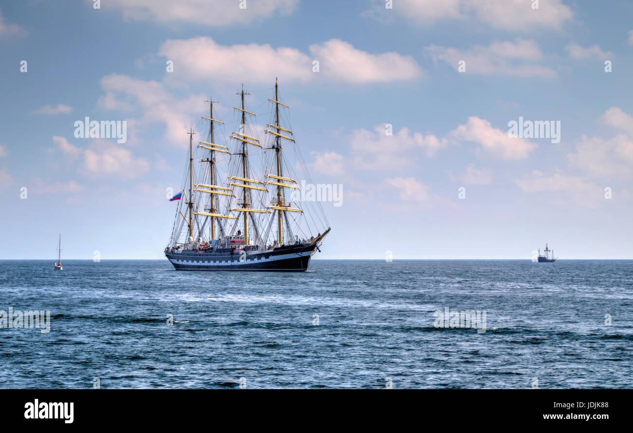 Sailing ship in the blue sea Stock Photo - Alamy