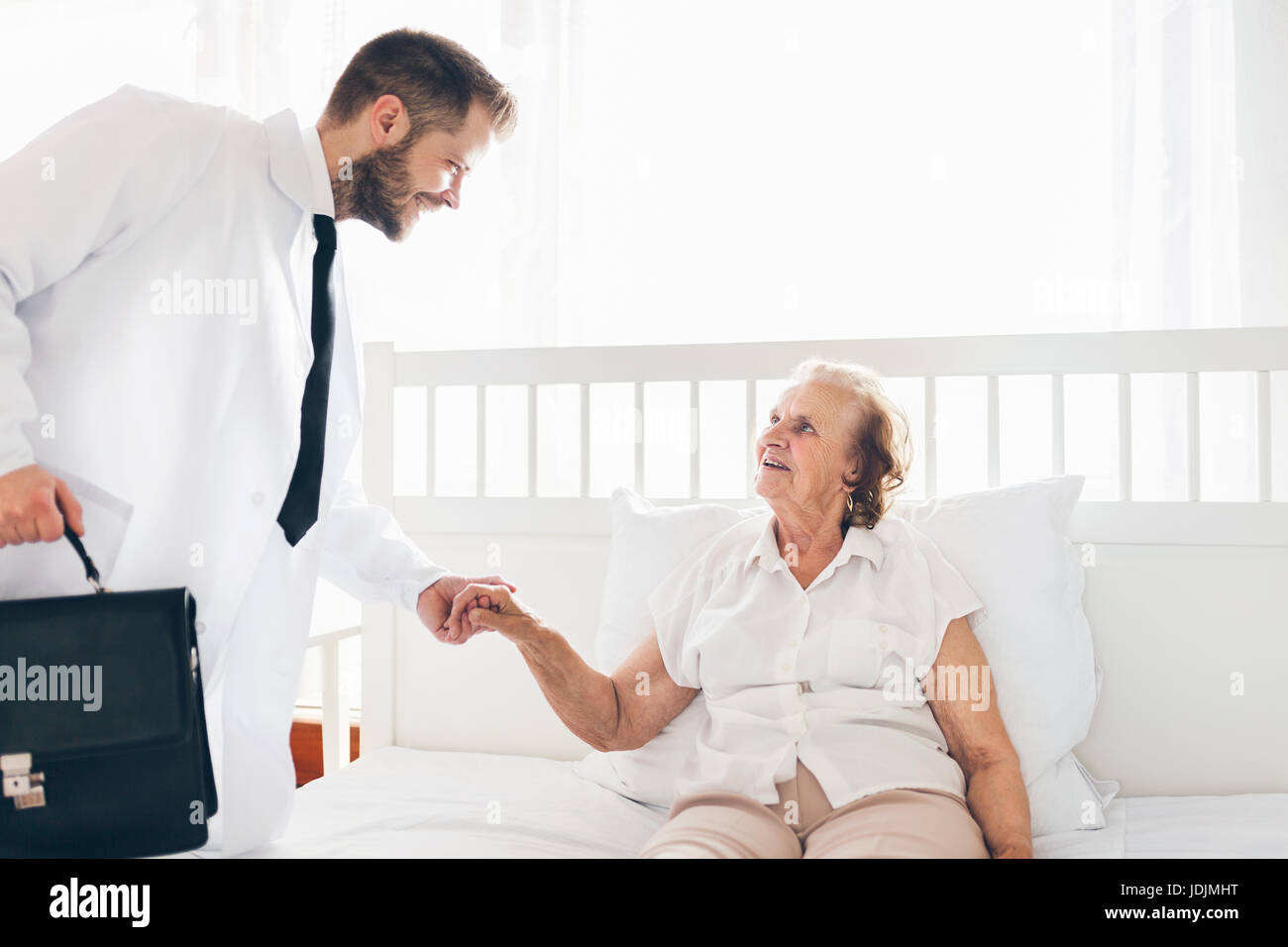 Medical home visit elderly hi-res stock photography and images - Alamy