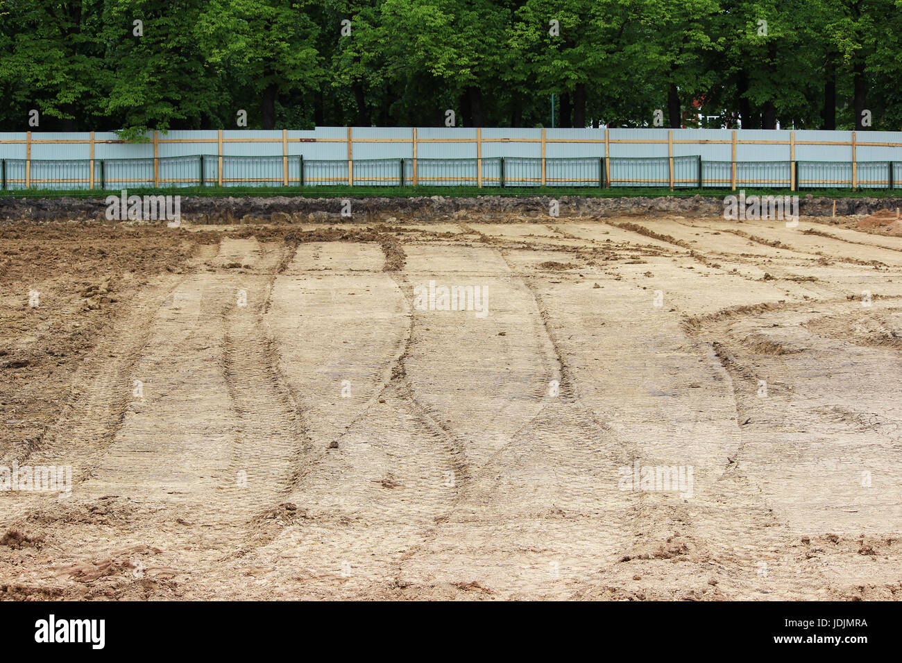 Wheel tracks in the mud, detail footprints asphalt compactor in the ...