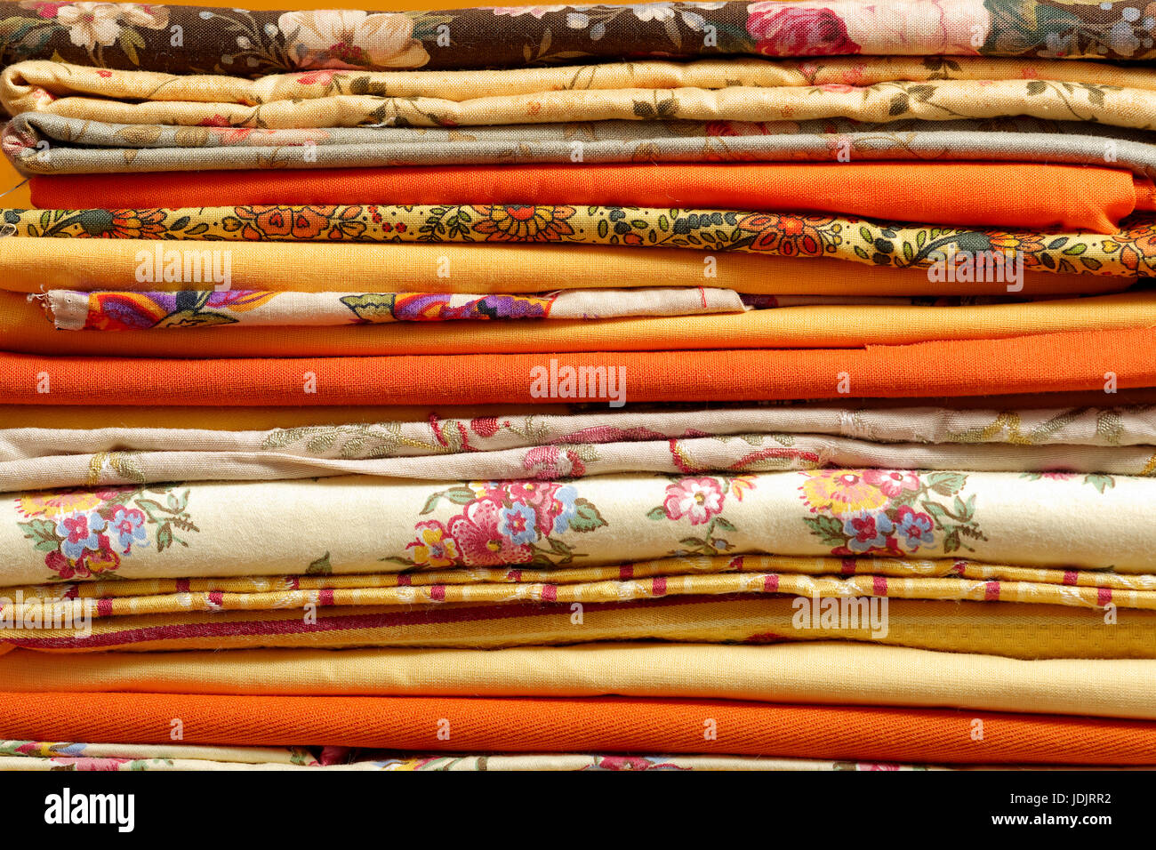 a stack of multicolored fabrics Stock Photo - Alamy