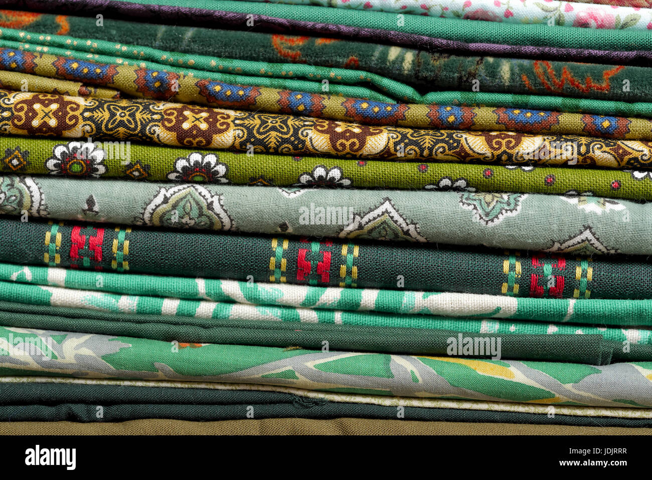 a stack of multicolored fabrics Stock Photo - Alamy