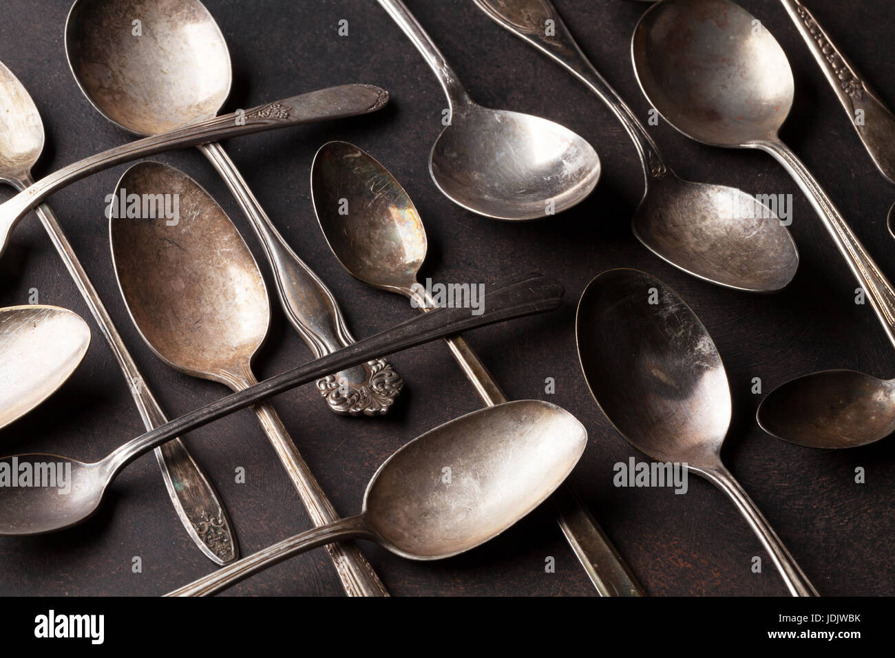 Old vintage spoons on stone table.Top view Stock Photo - Alamy