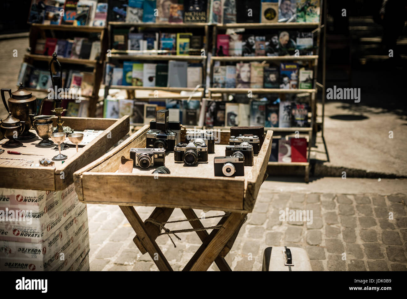 Old cameras on wooden table for sale Stock Photo - Alamy