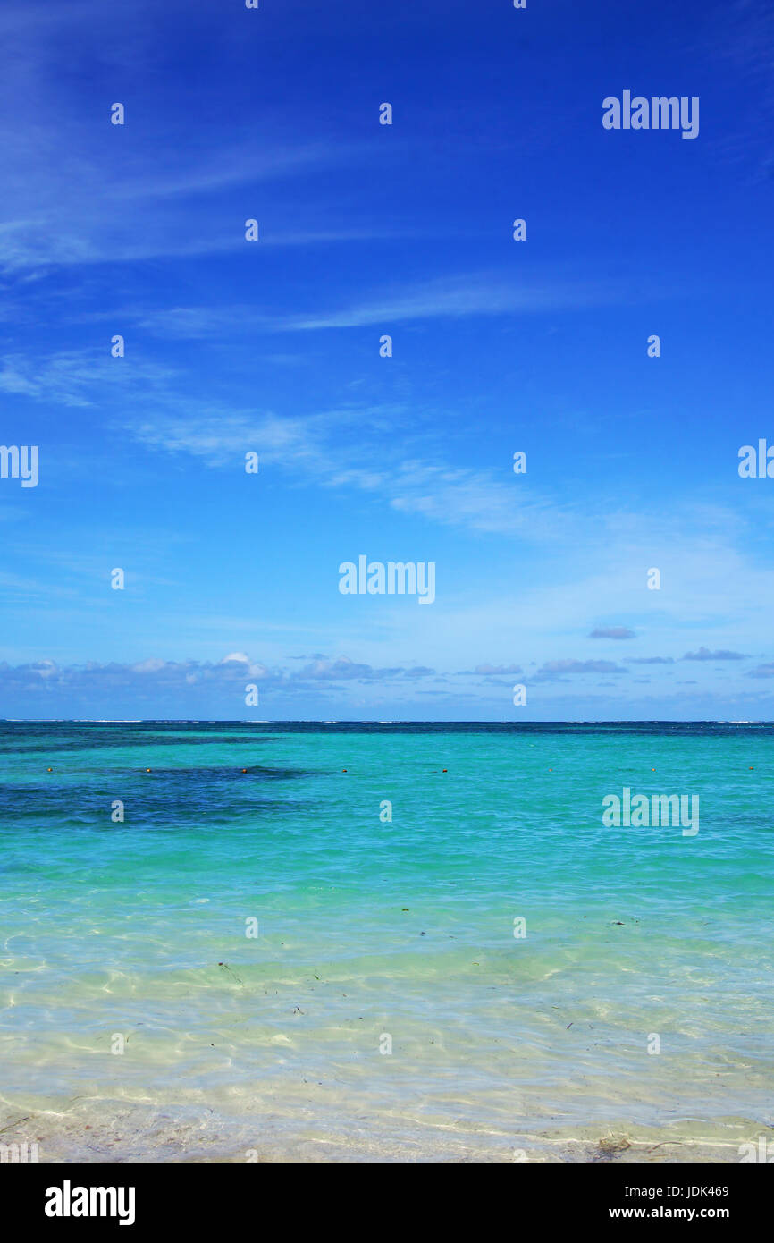 Paradise blue sea and sky, vertical, copy space Stock Photo - Alamy