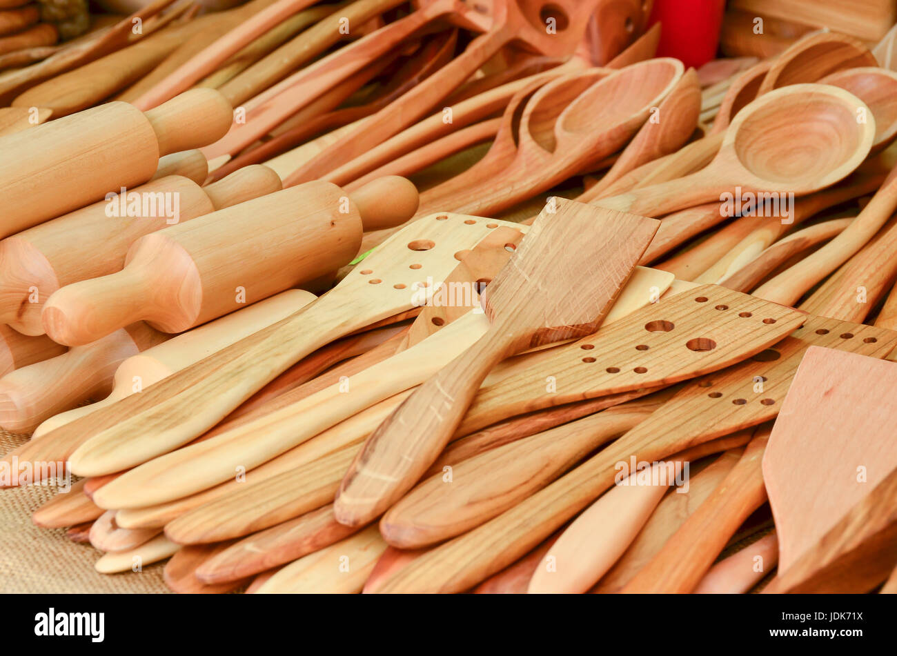 A collection of wooden kitchen utensils selling on market stall Stock ...