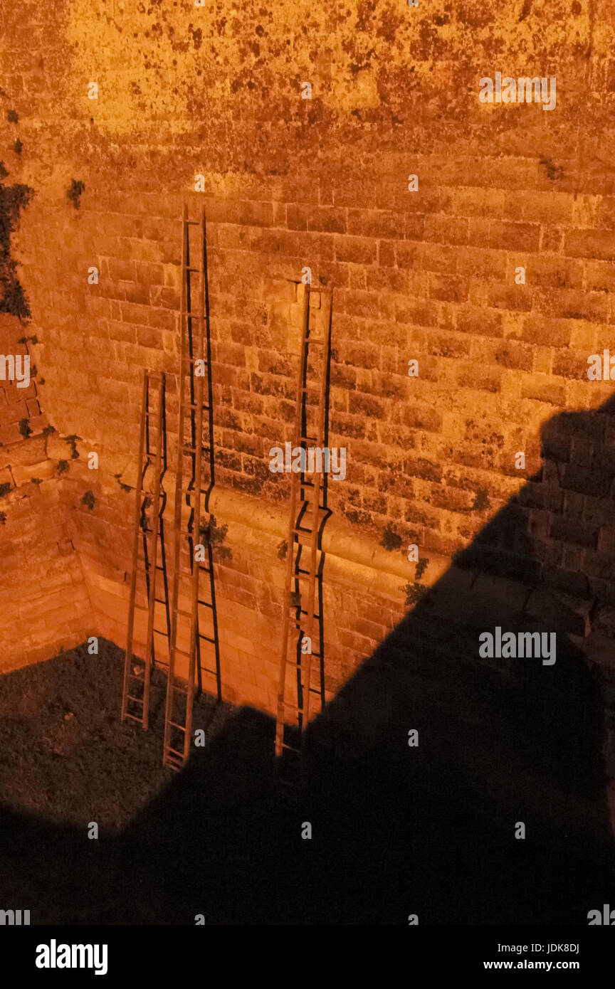 Wooden ladders resting on the walls of the Otranto castle Stock Photo ...