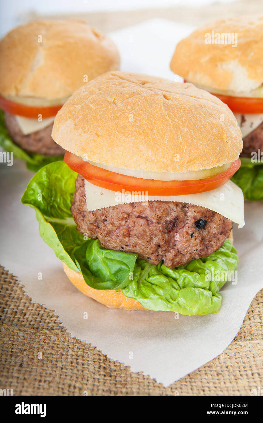 Giant homemade burger classic american cheeseburger on brown sack Stock ...
